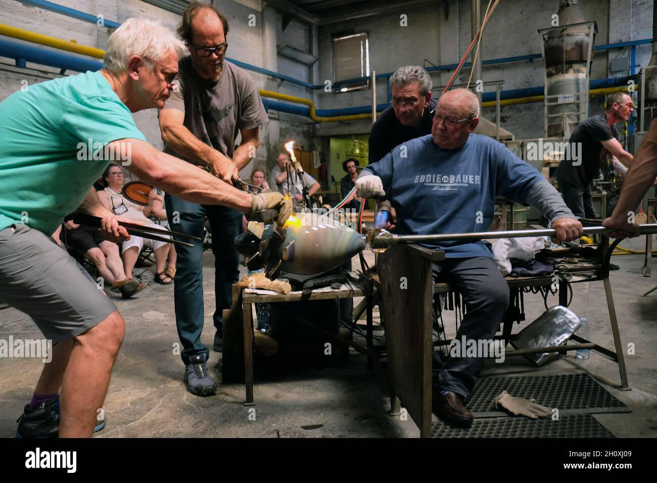 Master glass blower during hot glass working in Venice, Italy, May 15 ...