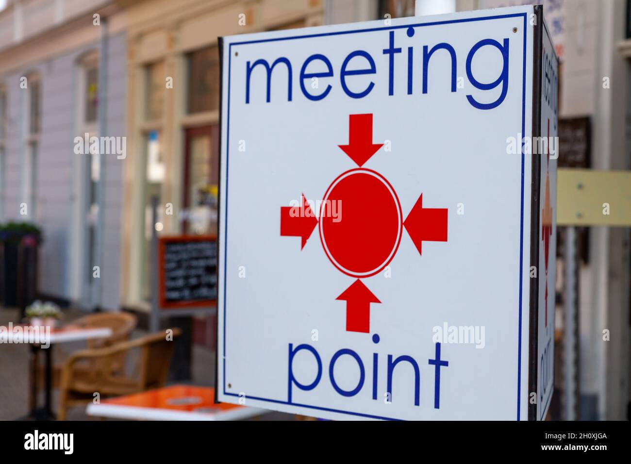 Closeup of a meeting point sign Stock Photo - Alamy