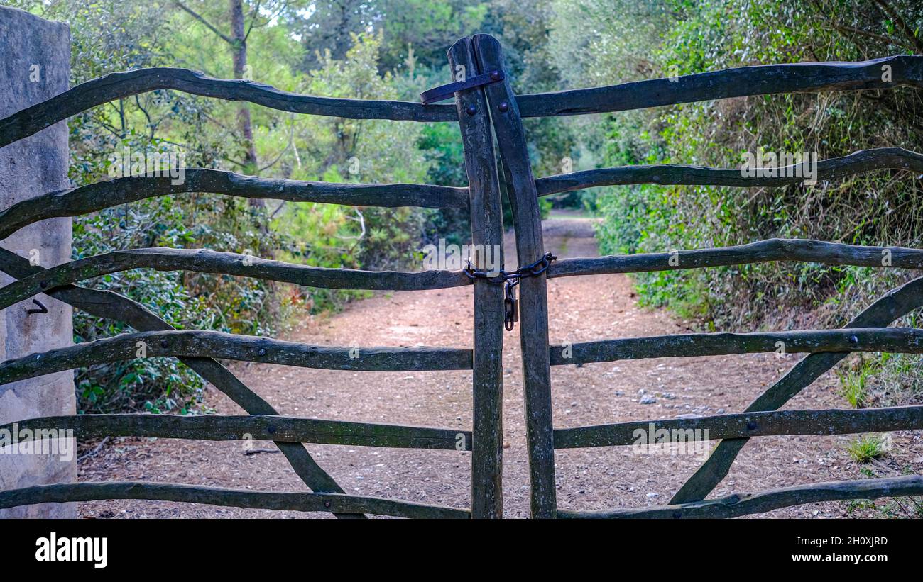 typical Minorcan gate made in wood with landscape behind. Menorca ...
