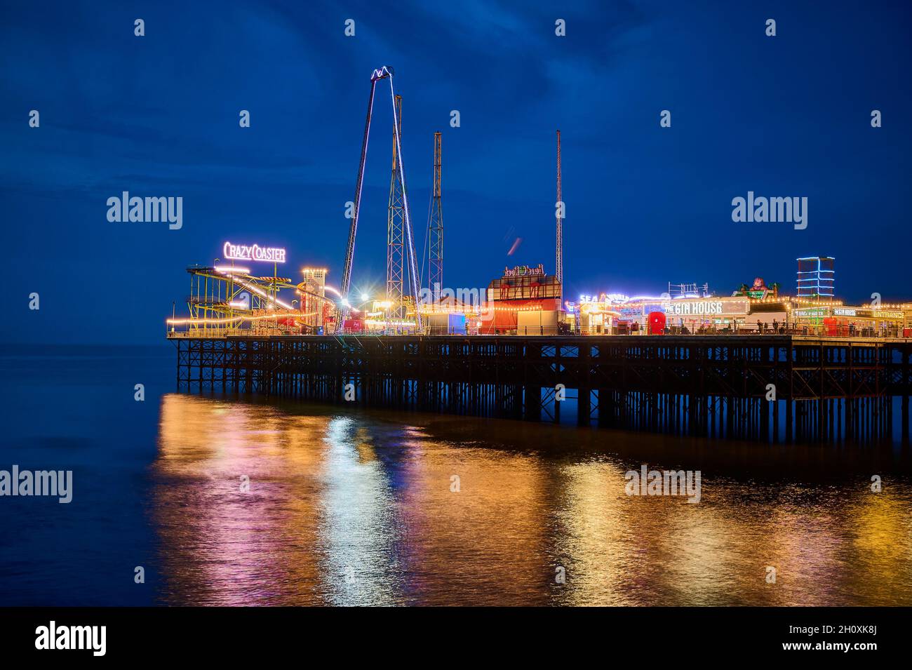 Funfair rides on South Pier Blackpool at dusk during the 2021 ...
