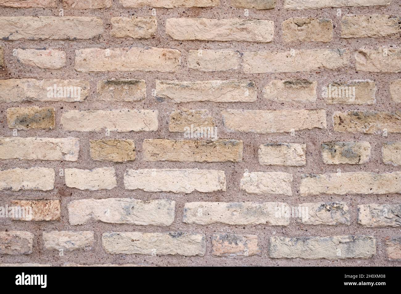 Medieval old european grey and brown brick wall background Stock Photo ...