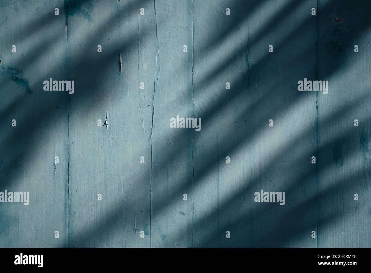 Light blue wood material texture background with shadow. Hardwood ...