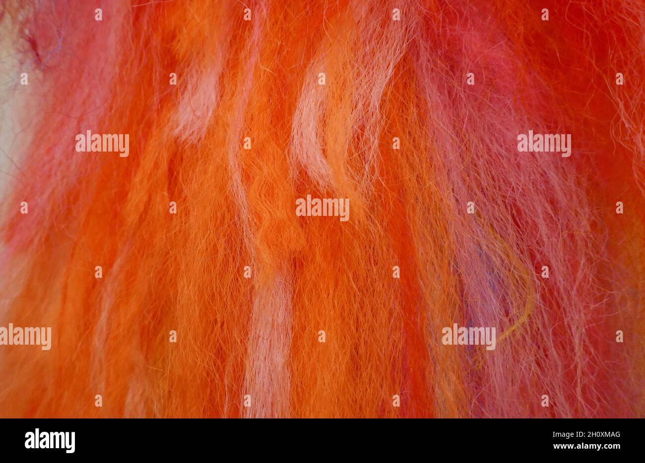 Fluffy wool-like threads in the colors red, orange, pink, white Stock ...