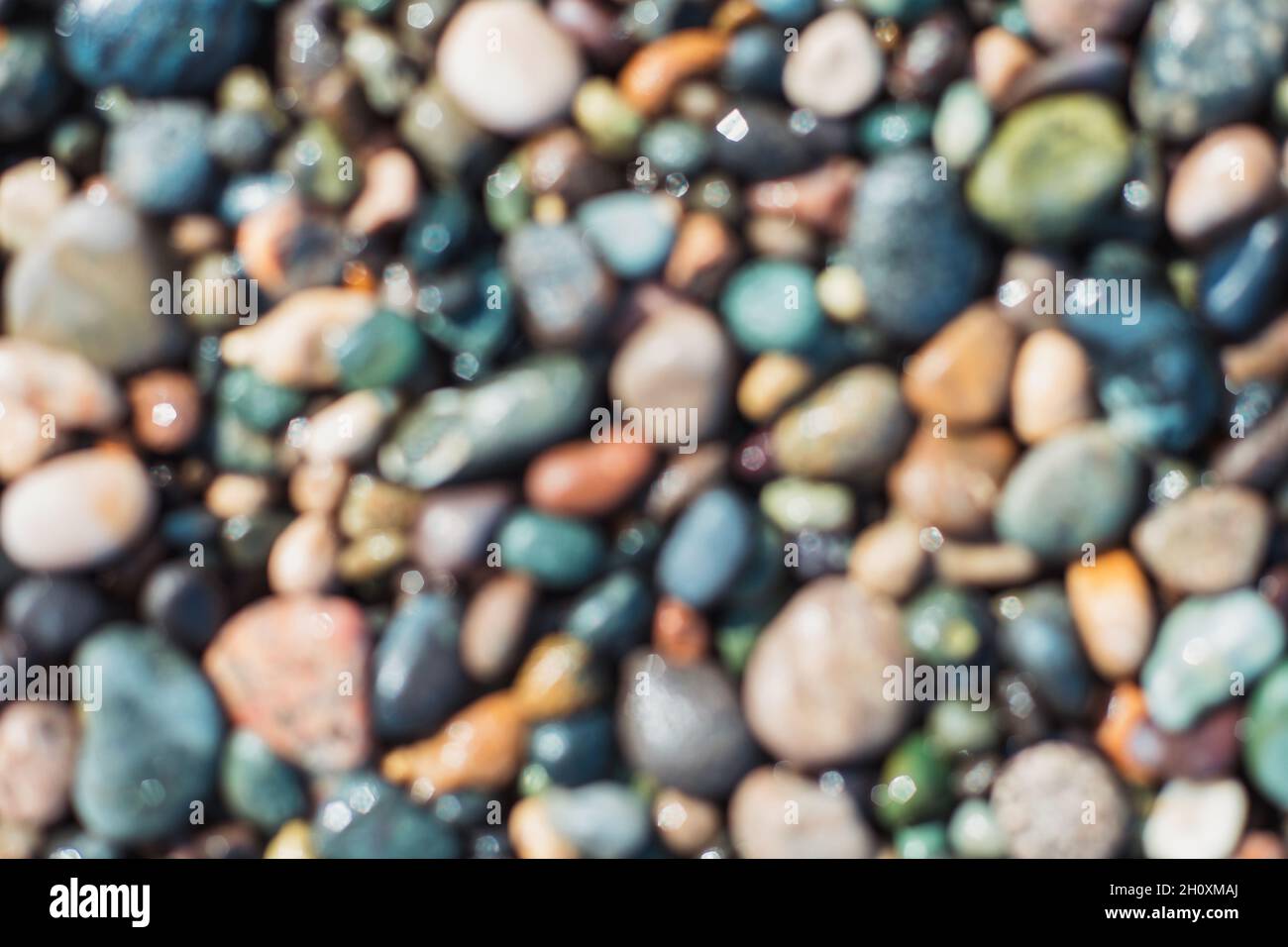 Blurred wet beach pebble background - nautical backdrop and mockup ...