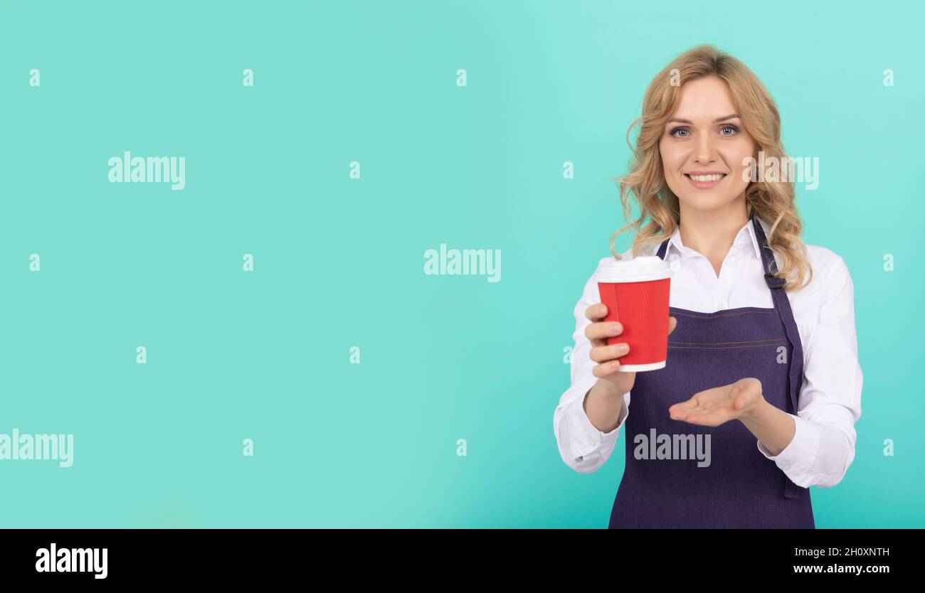 happy woman barista in cook apron drink takeaway coffee, copy space ...