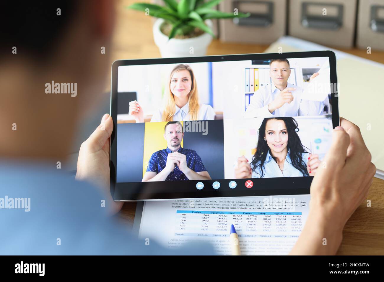 Woman is holding online conference via tablet Stock Photo - Alamy