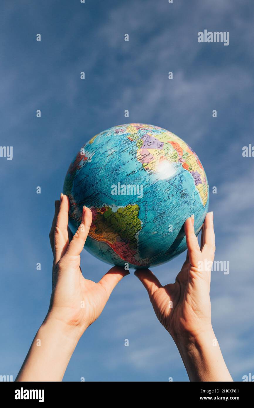 Planet earth saved together - common house Stock Photo - Alamy