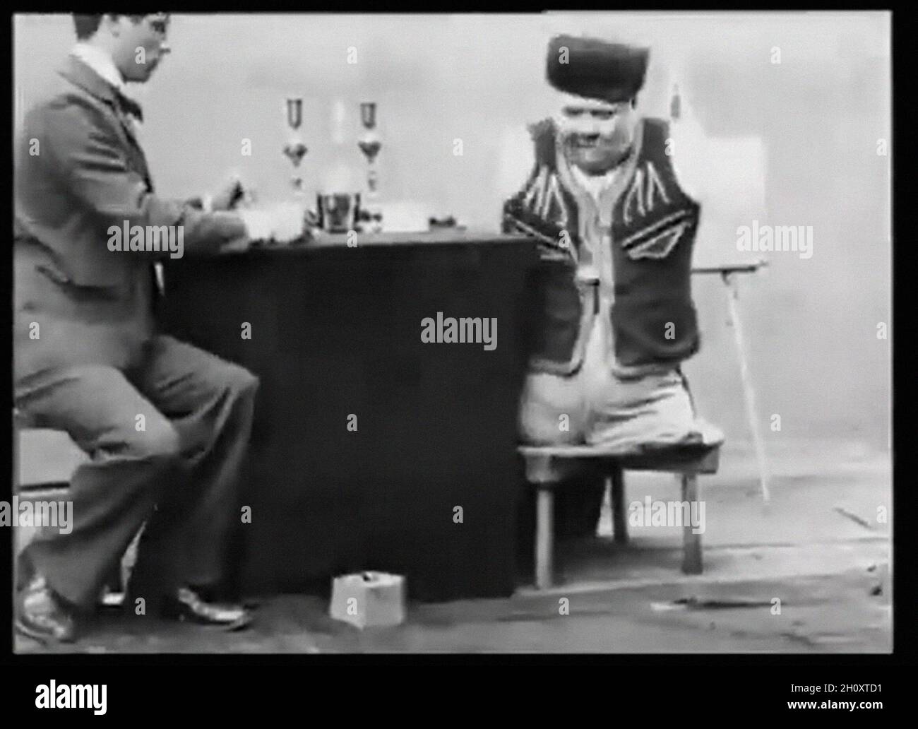 Vintage still of a man with no limbs Stock Photo - Alamy
