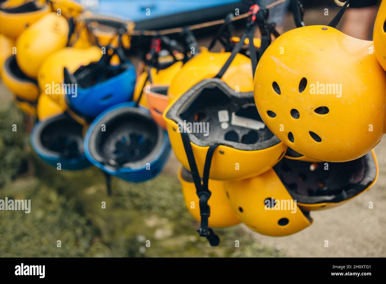 Yellow protective durable plastic helmets for rafting boating ...