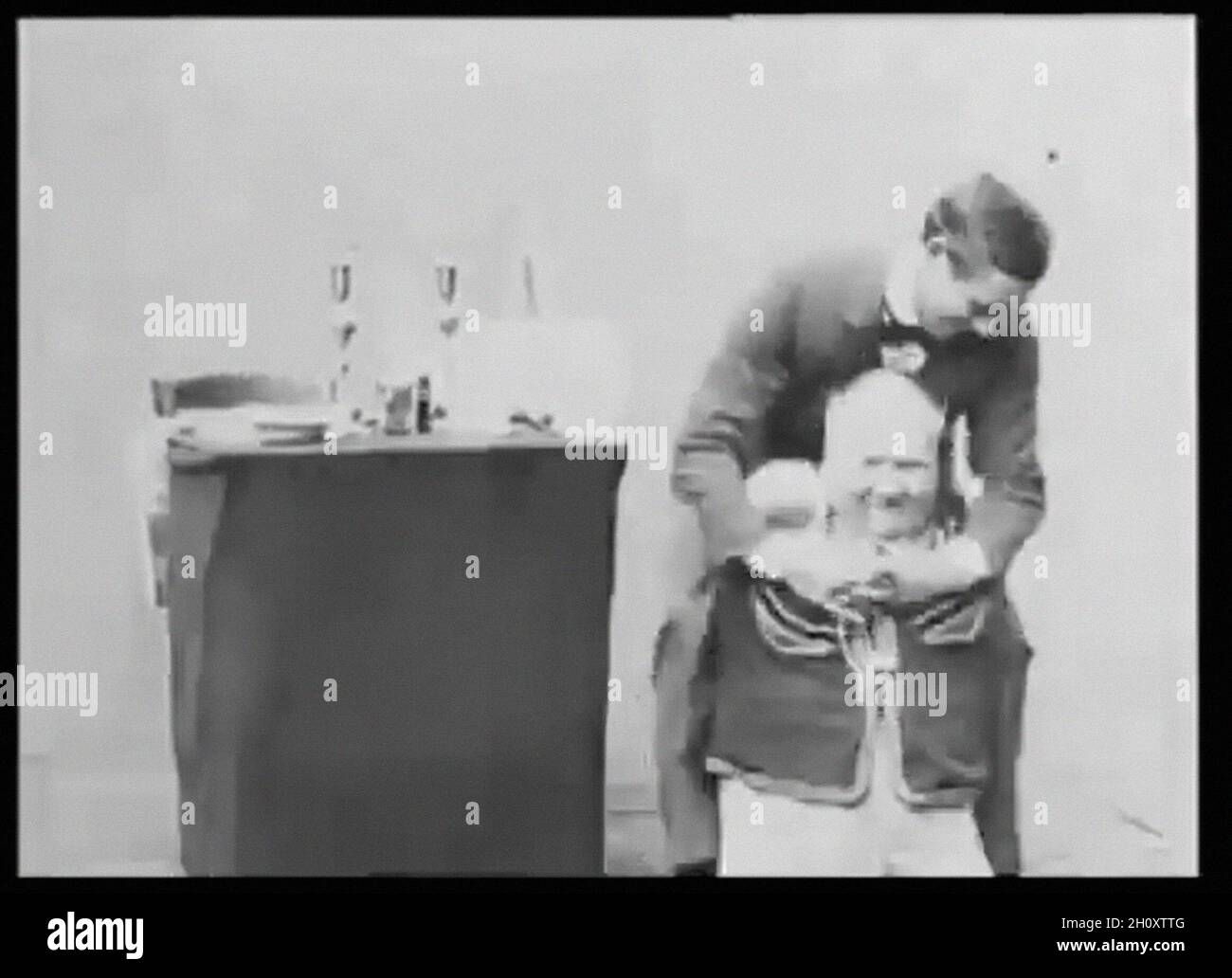 Vintage still of a man with no limbs Stock Photo - Alamy