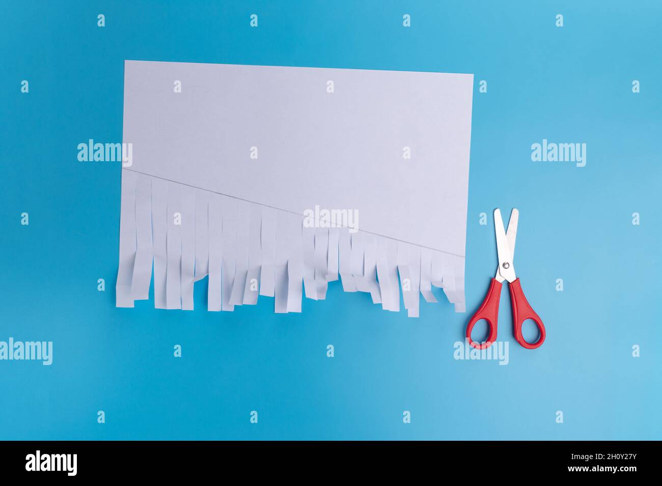 paper and scissors to make a craft, DIY autumn tree craft, step 2 Stock ...