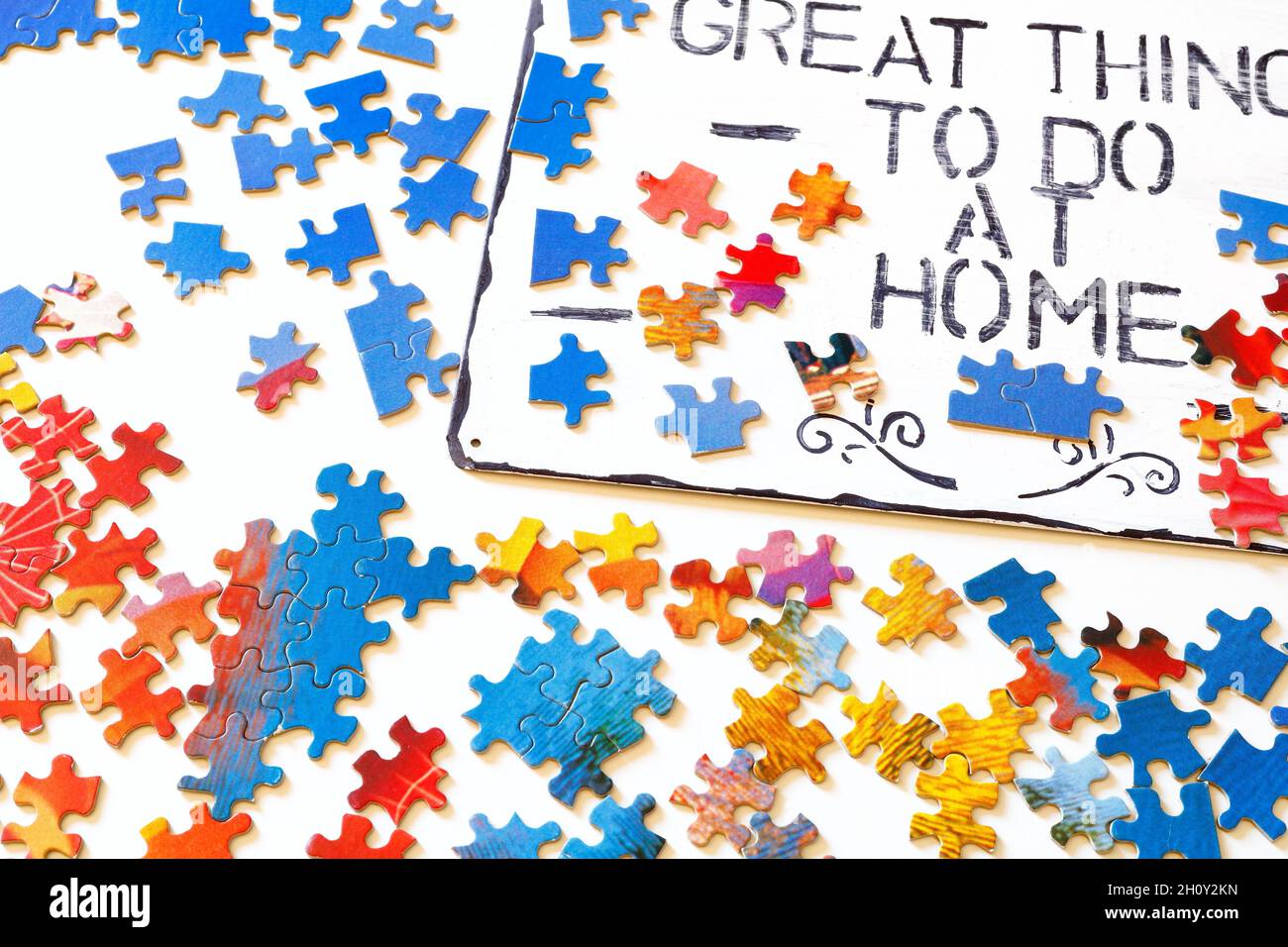 jigsaw puzzle with great things to do at home poster Stock Photo - Alamy