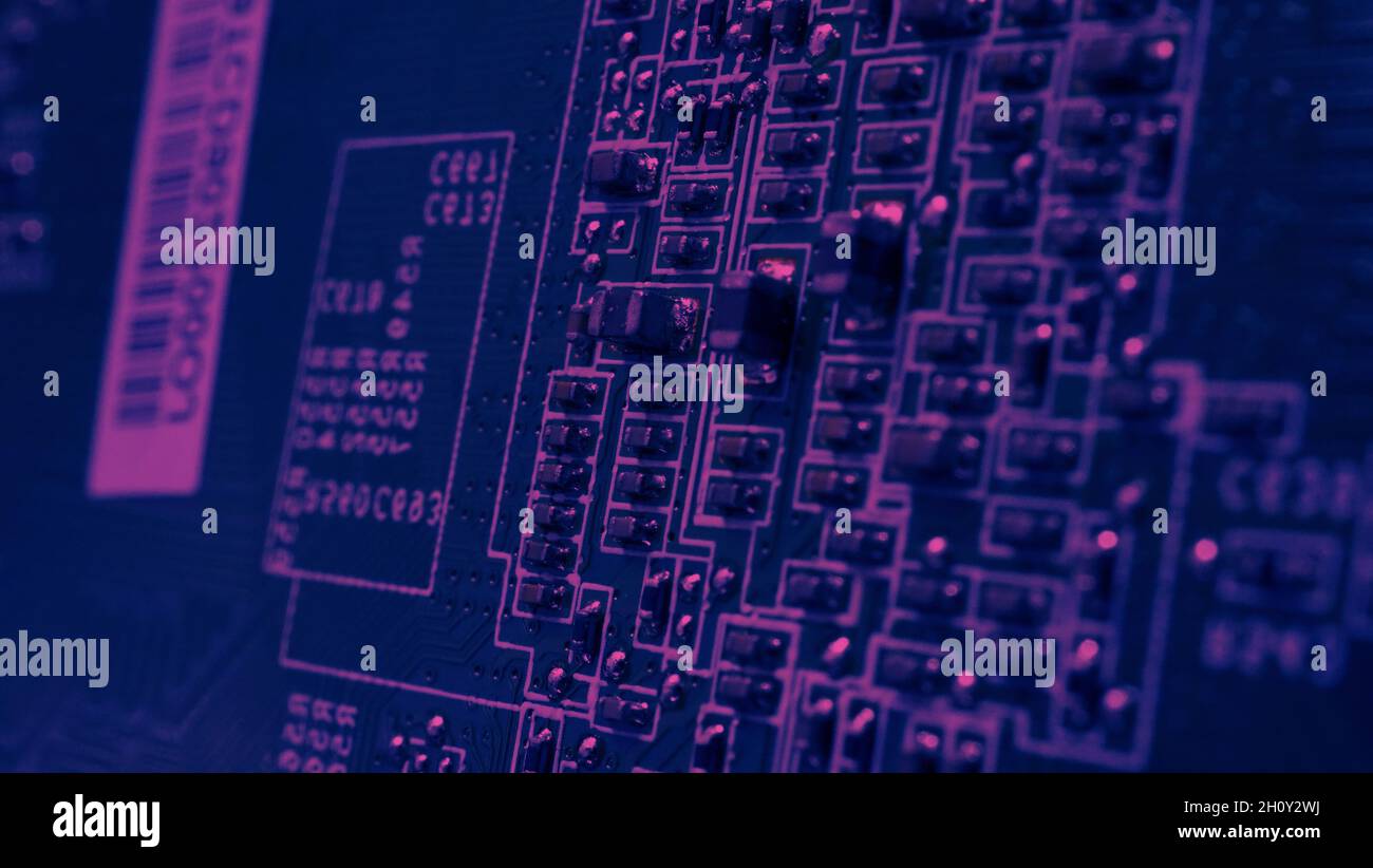 Semiconductor. cpu chip located on the green motherboard of the ...