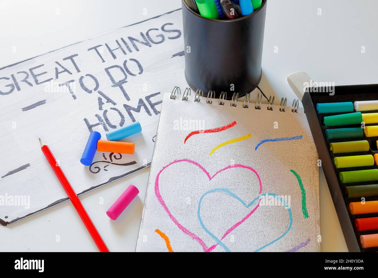 To do at the home drawing with colored crayons Stock Photo - Alamy