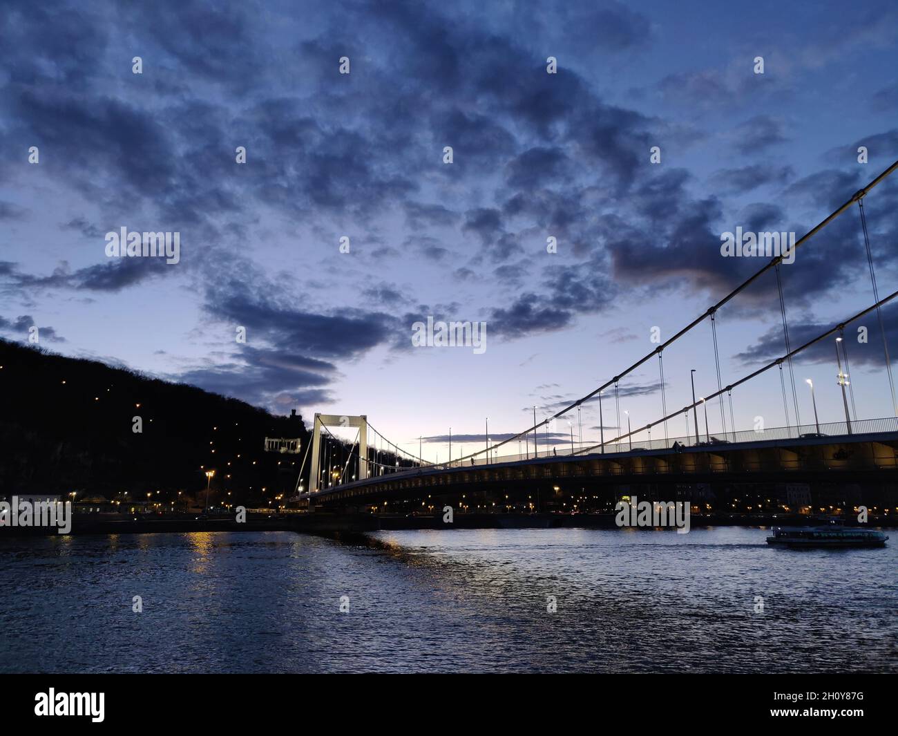 Bridge under the sky Stock Photo - Alamy