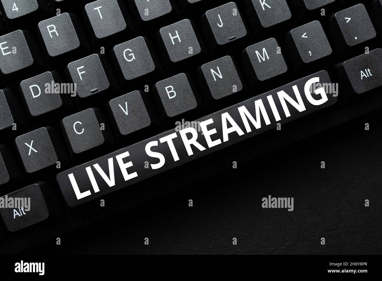 Text caption presenting Live Streaming. Business overview Transmit live ...