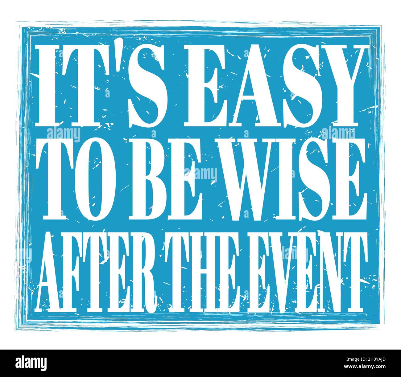 IT'S EASY TO BE WISE AFTER THE EVENT, written on blue grungy stamp sign ...
