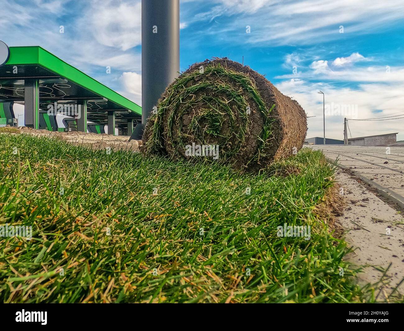 Rolled lawn preparation for laying Stock Photo - Alamy