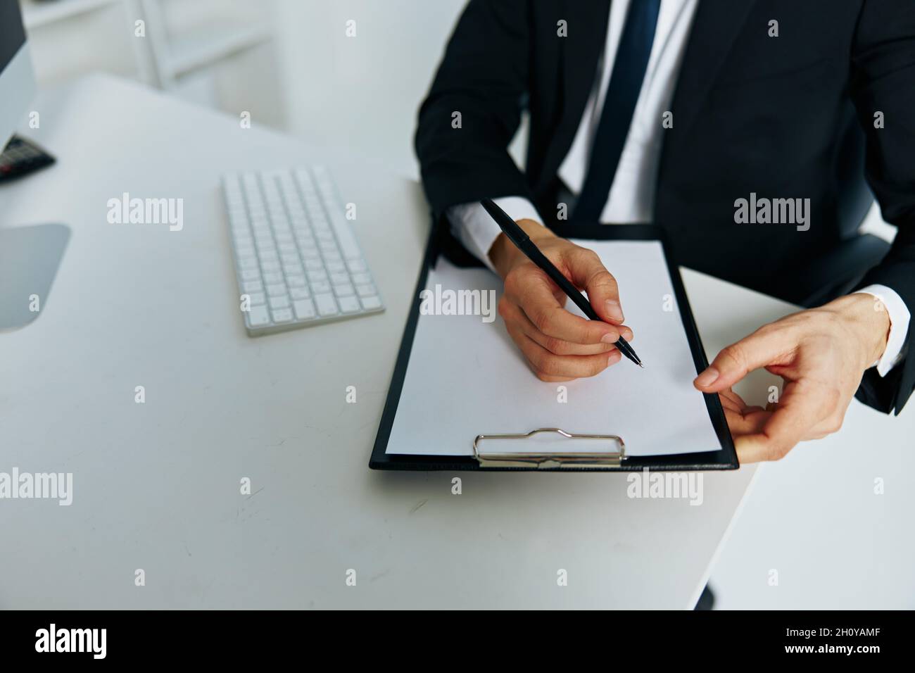 male manager in a suit office work phone executive Stock Photo - Alamy
