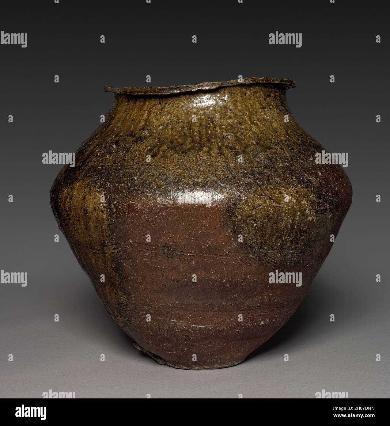 Stoneware with natural ash glaze and impressed designs hi-res stock ...