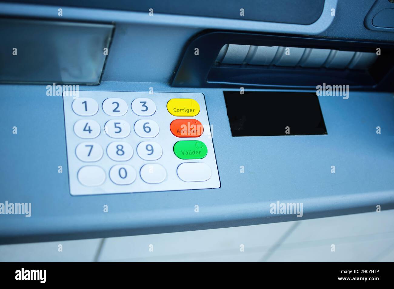 View from above of new ATM keypad numbers with french text engraved on ...