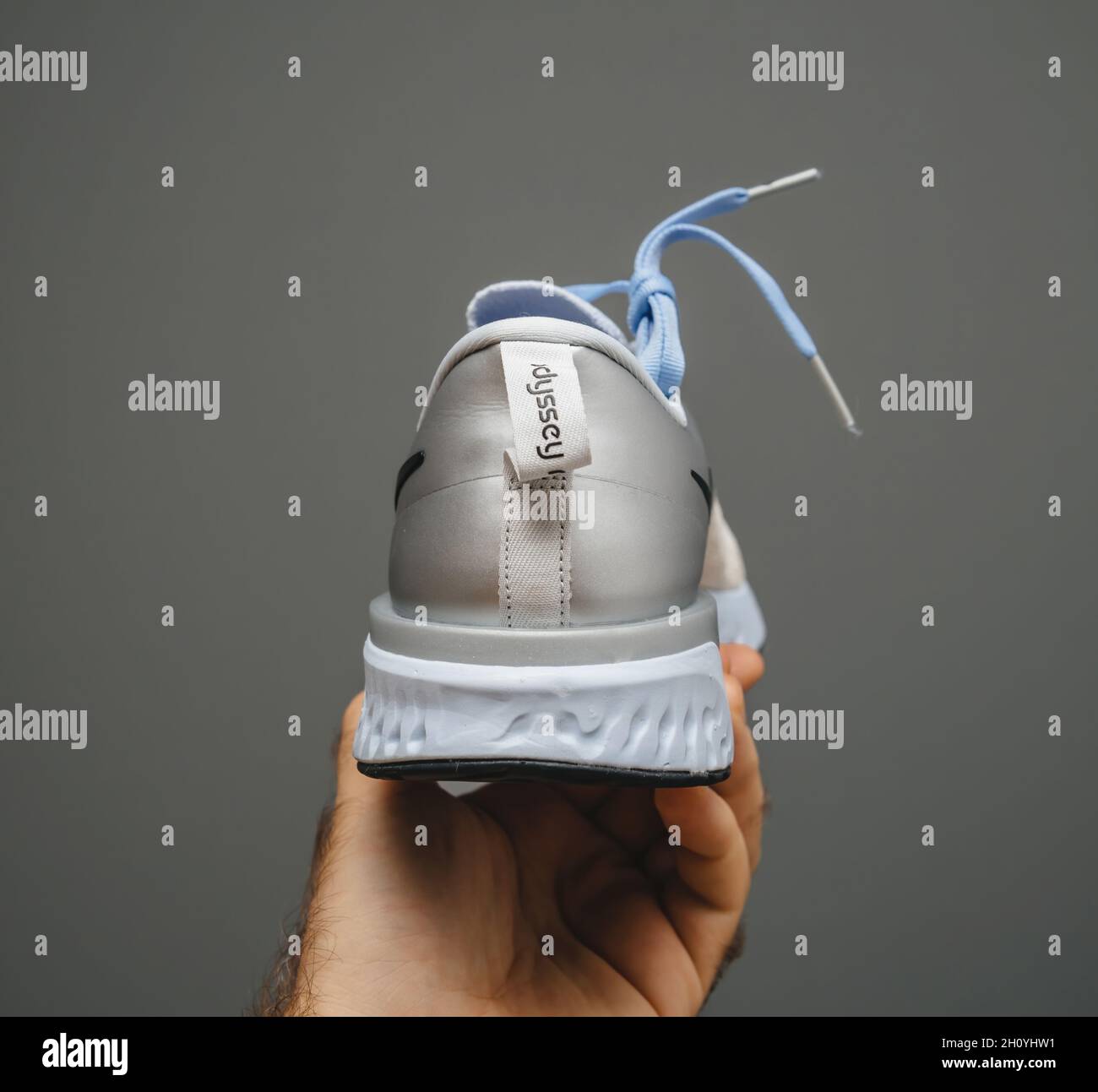 Holding nike shoe hi-res stock photography and images - Alamy