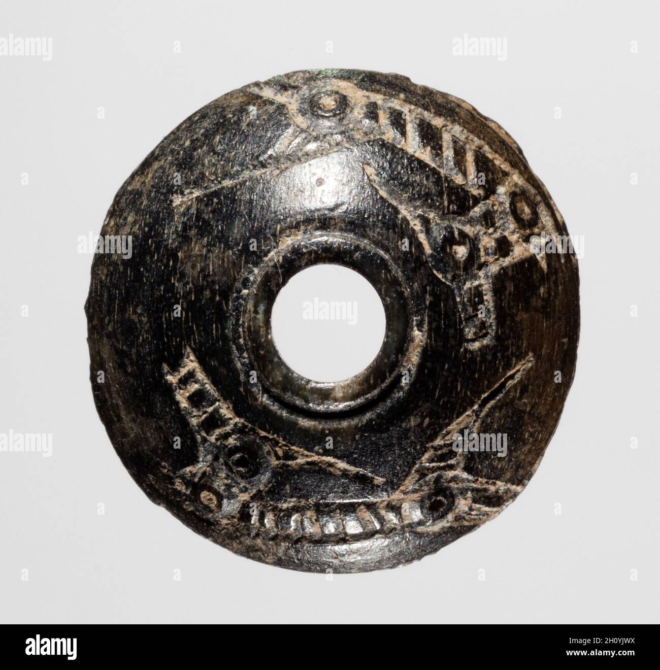 Spindle Whorl, 700s - 900s. Iran, early Islamic period, 8th - 10th century. Bone, incised ...
