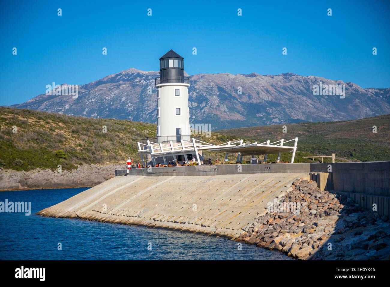 Lustica Bay, Montenegro - October 1, 2021: Lighthouse with restaurant ...