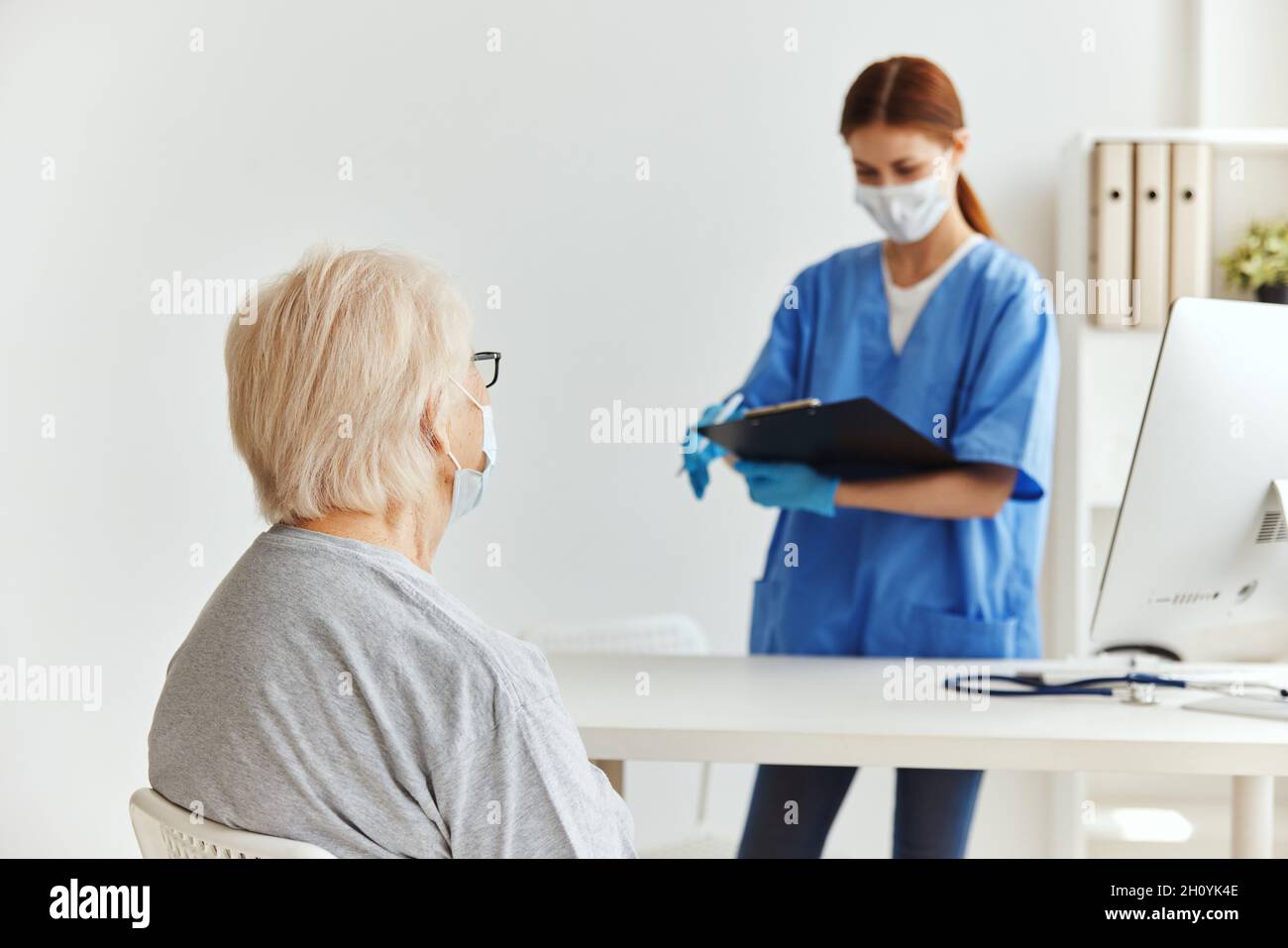 female doctor examination medical masks Stock Photo - Alamy