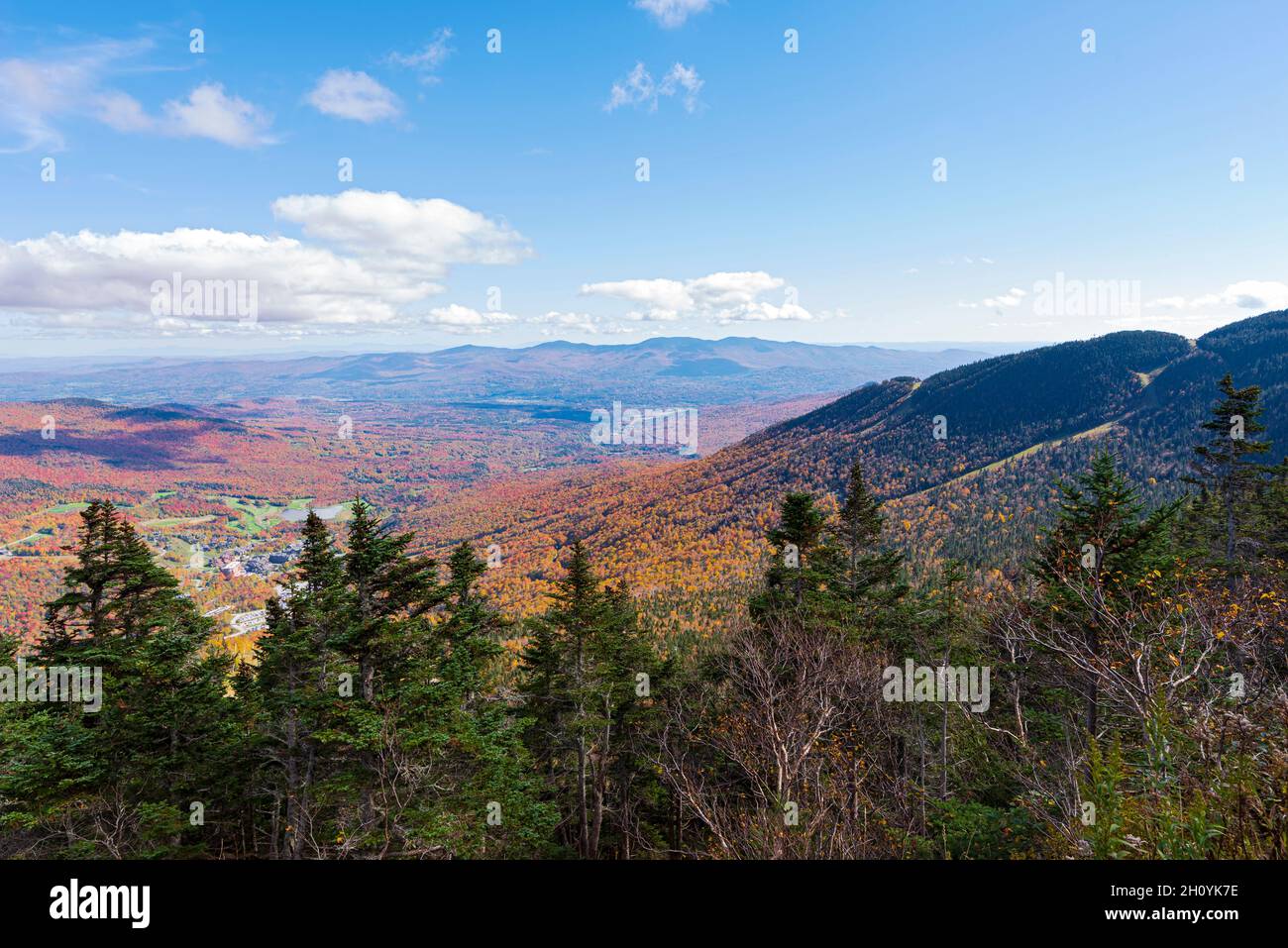 atop mount mansfield overlooking wooded slopes of stowe vermont during ...