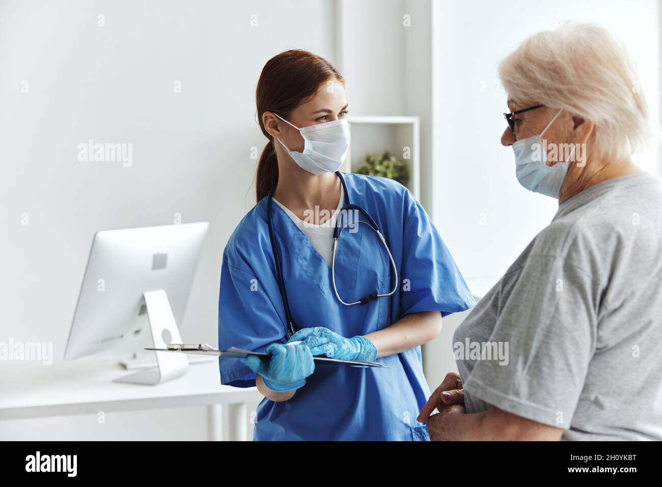 female doctor Hospital visit medical office Stock Photo - Alamy