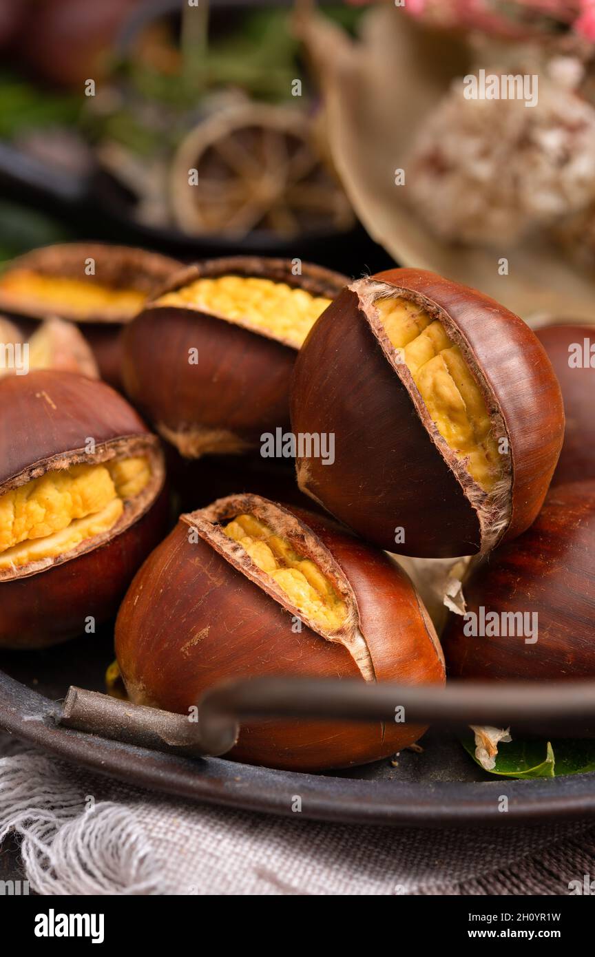 autumn background with Italian chestnuts Stock Photo - Alamy