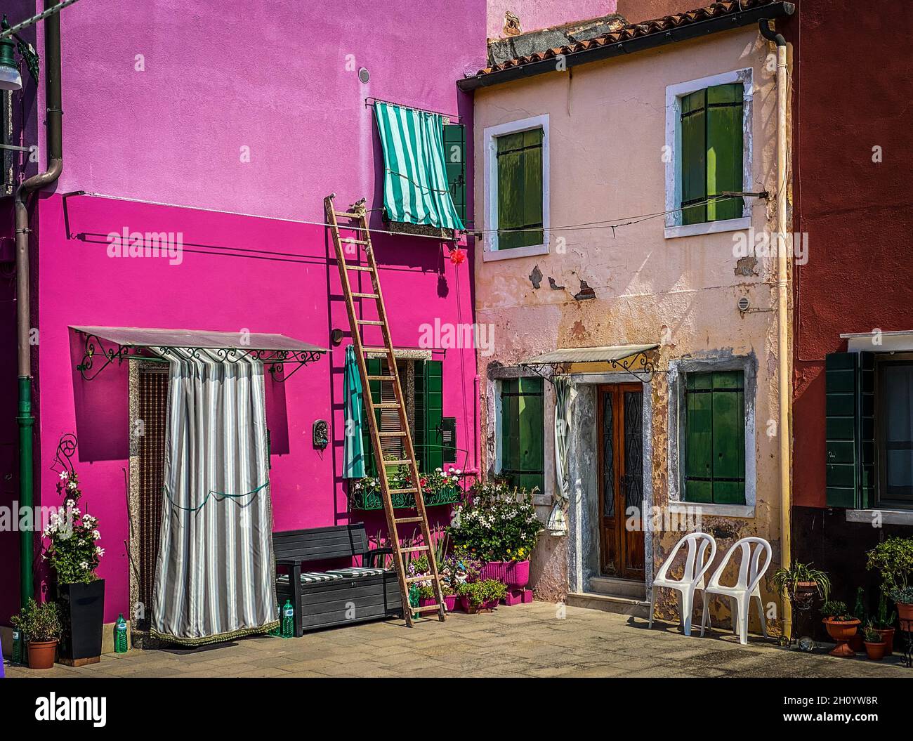 Colorfull painted front houses and Front yard at Brurano Island, Venice ...