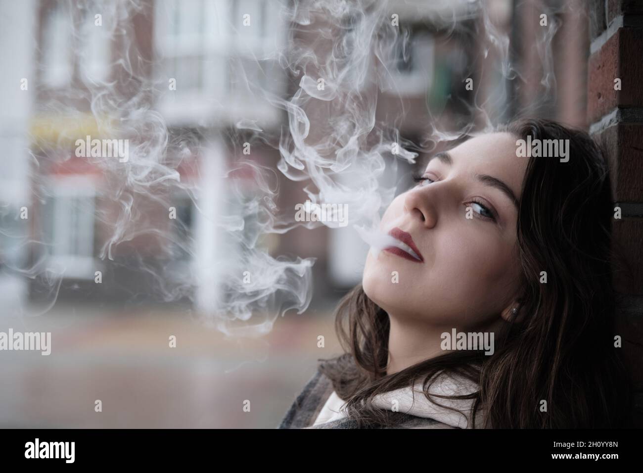 Young woman open mouth smoke hi-res stock photography and images - Alamy