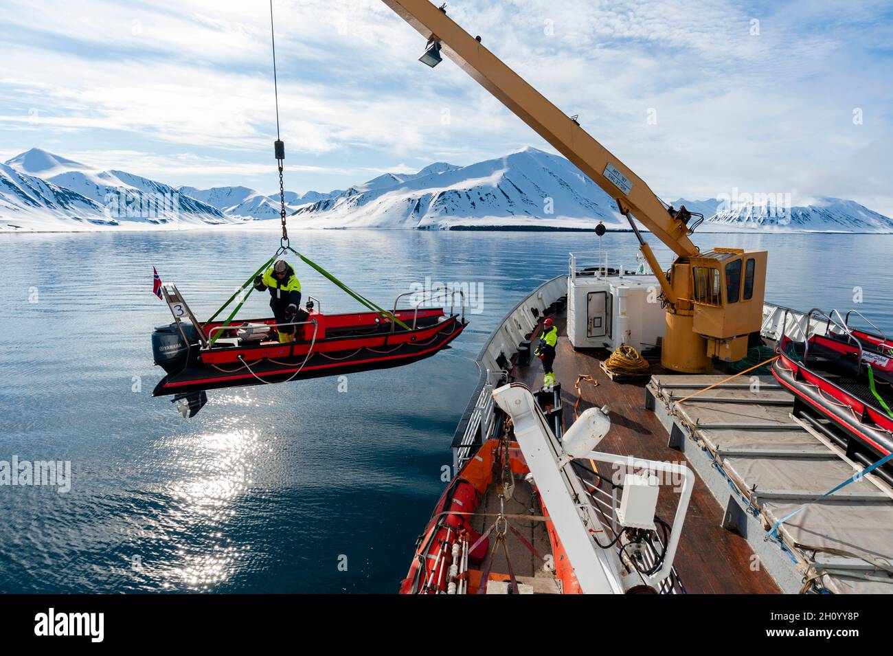 A motorized raft is launched from a cruise ship on Mushamna Bay ...