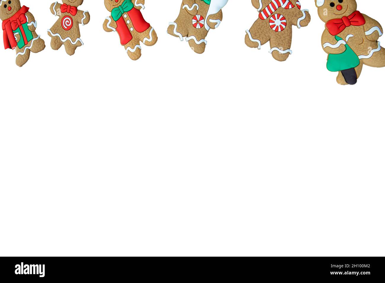 Gingerbread man cookies in a row isolated on white background, copy ...