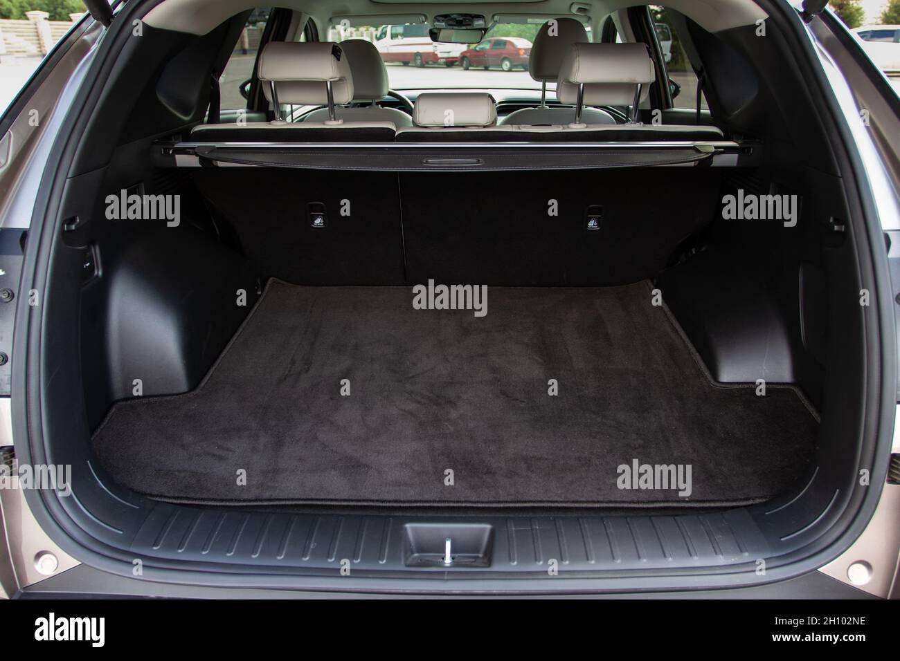 Huge, clean and empty car trunk in interior of a modern compact suv ...