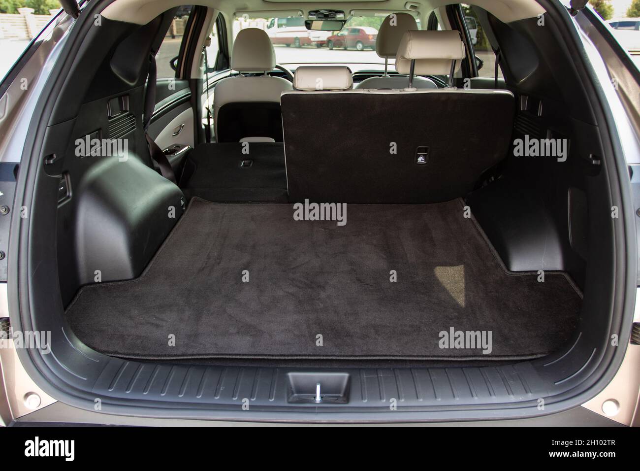 Huge, clean and empty car trunk of a modern compact suv. Rear view of a ...