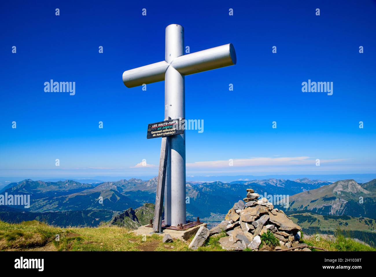 The cross on the summit of Les Hauts-Forts, a mountain of the Alps ...