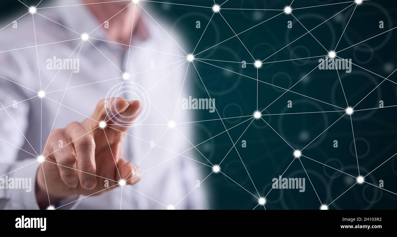 Man touching a virtual network on a touch screen with his finger Stock ...