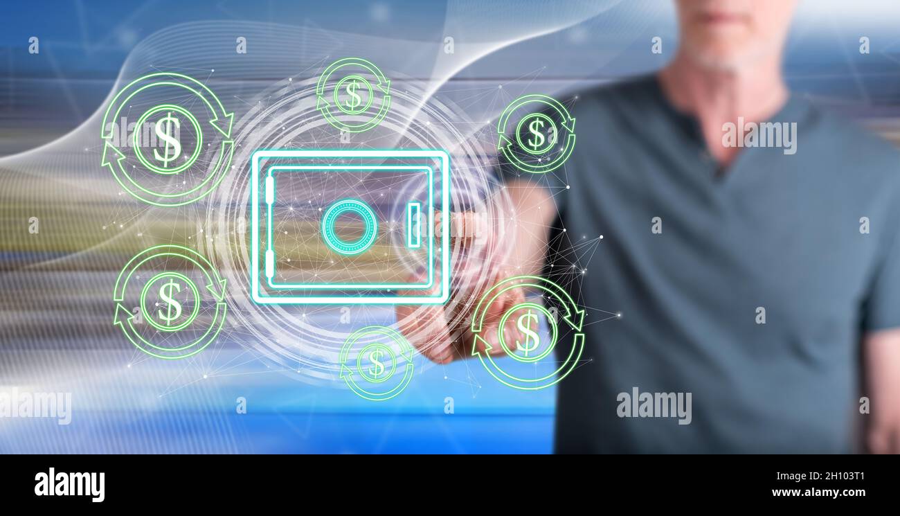 Man touching a secure money transfer concept on a touch screen with his ...