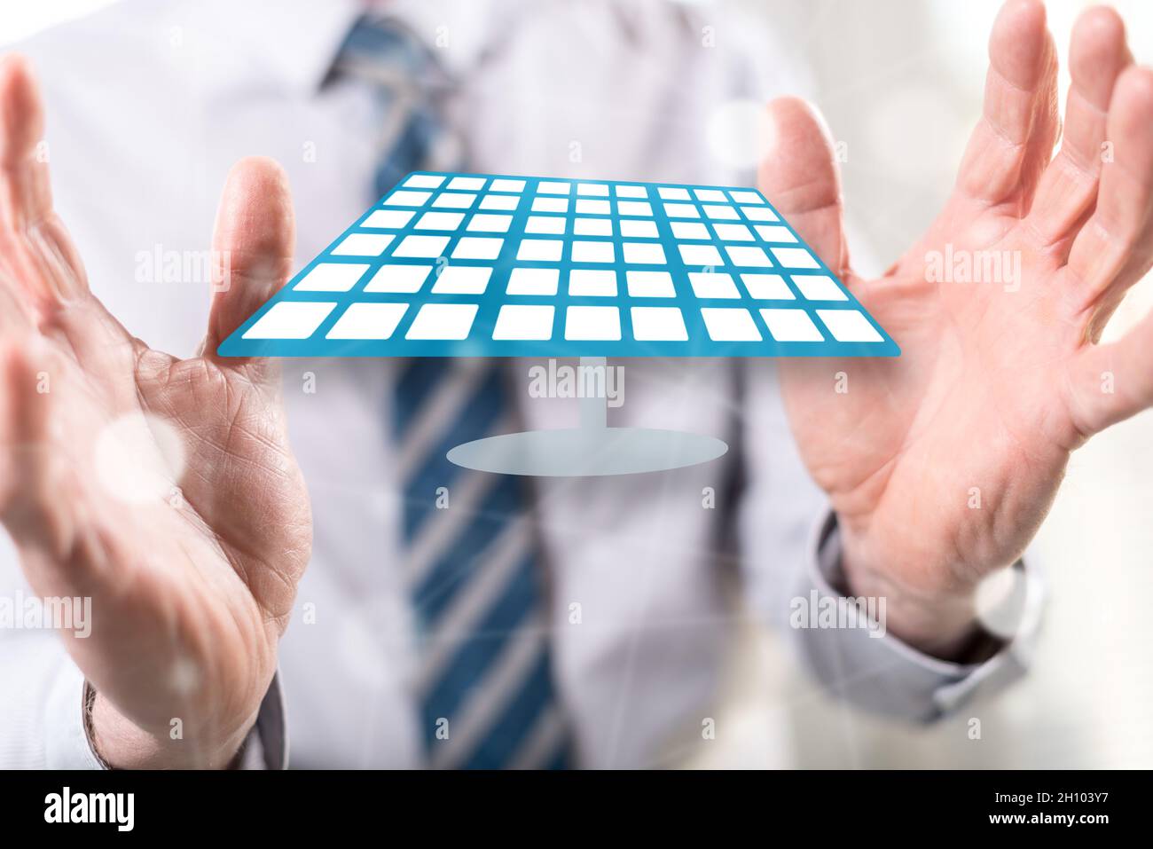 Clean energy concept between hands of a man in background Stock Photo ...