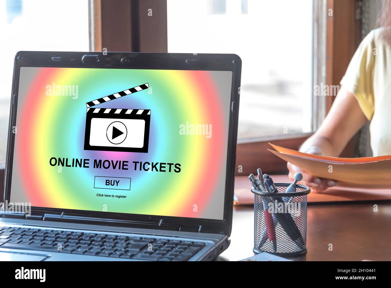Laptop screen displaying an online movie tickets buying concept Stock ...