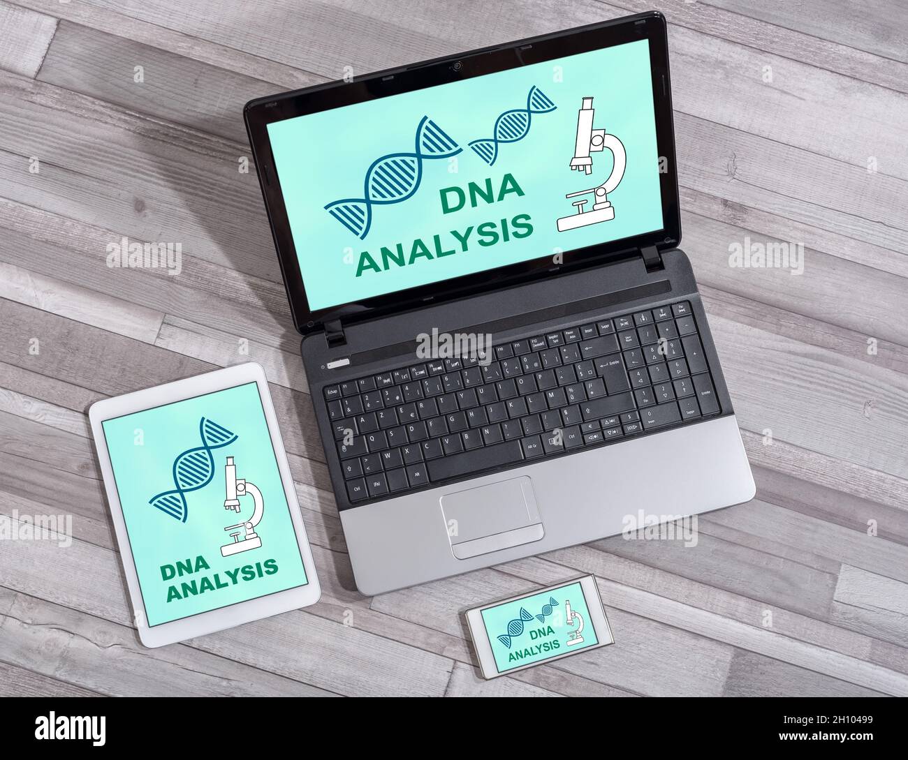 Dna analysis concept shown on different information technology devices ...