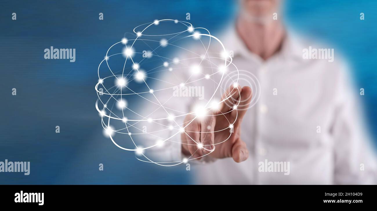 Man touching a global connection concept on a touch screen with his ...