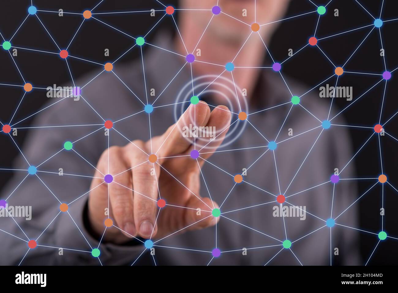 Man touching a virtual network on a touch screen with his finger Stock ...