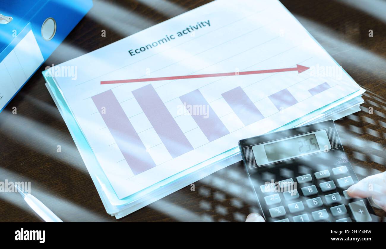 Calculation of bad economic activity, light effect Stock Photo - Alamy