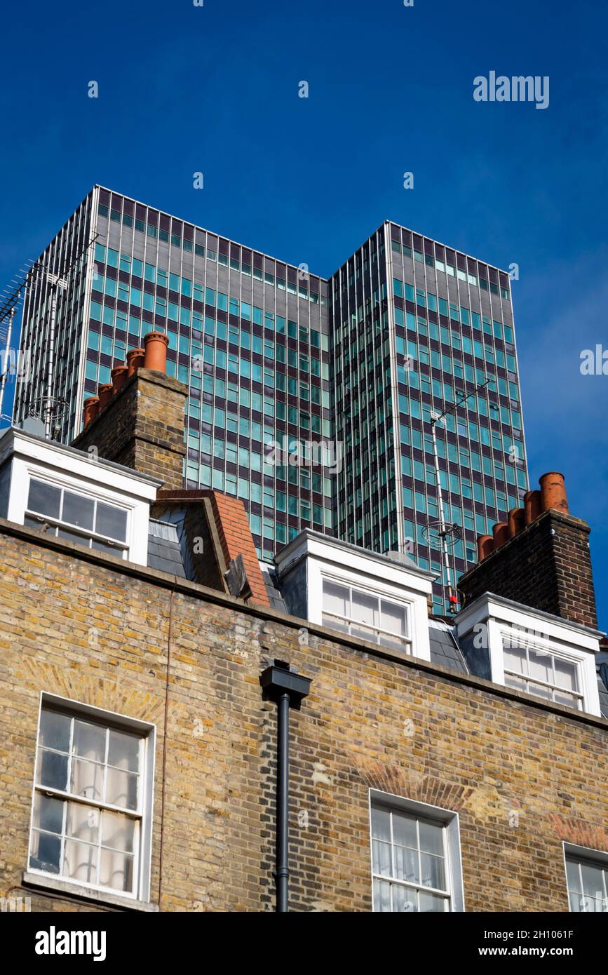 Old buildings contrasted with modern glass towers of Euston Station ...
