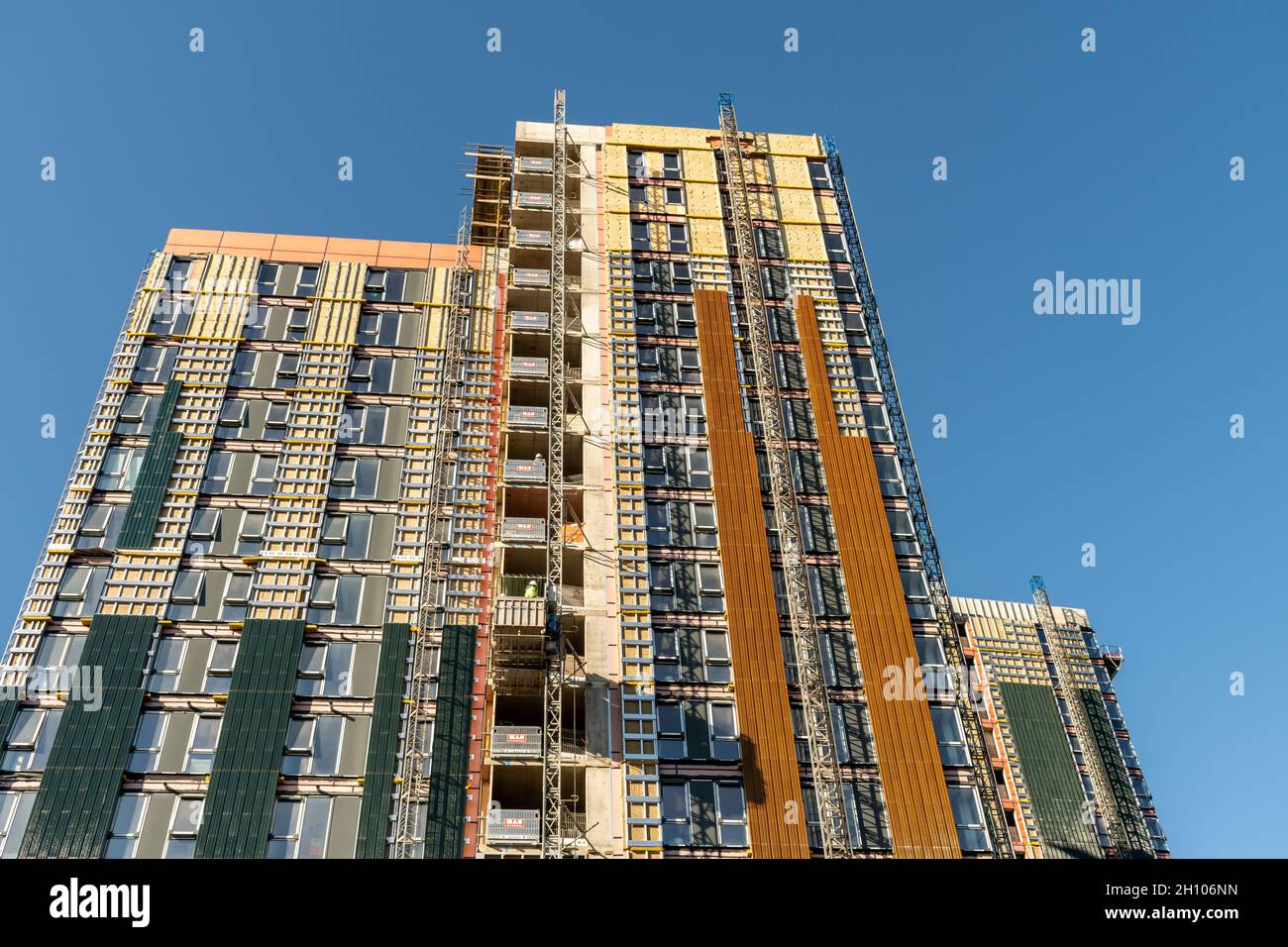 A low-angle shot of a build-to-rent apartment building under ...