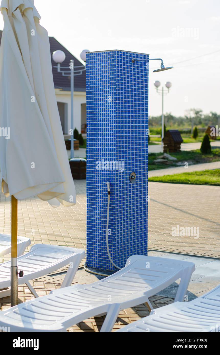 Outdoor shower by the pool. Outdoor shower Stock Photo - Alamy